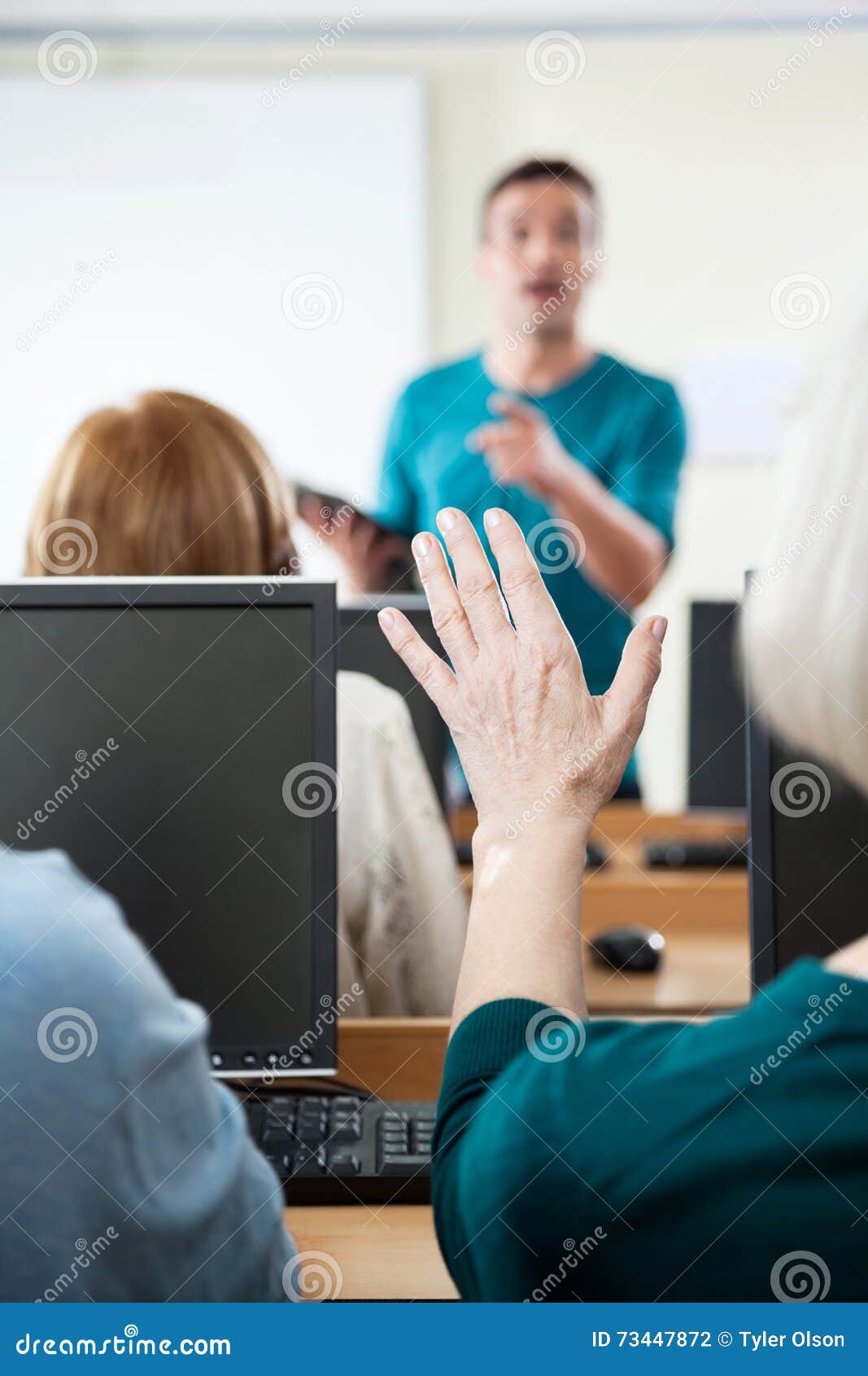 Senior Woman Asking Question in Computer Class Stock Photo - Image of ...