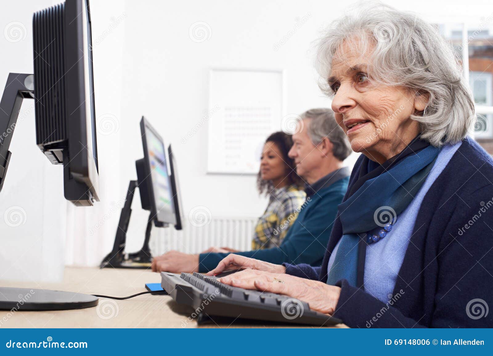 Senior Woman Attending Computer Class Stock Photo - Image of campus ...