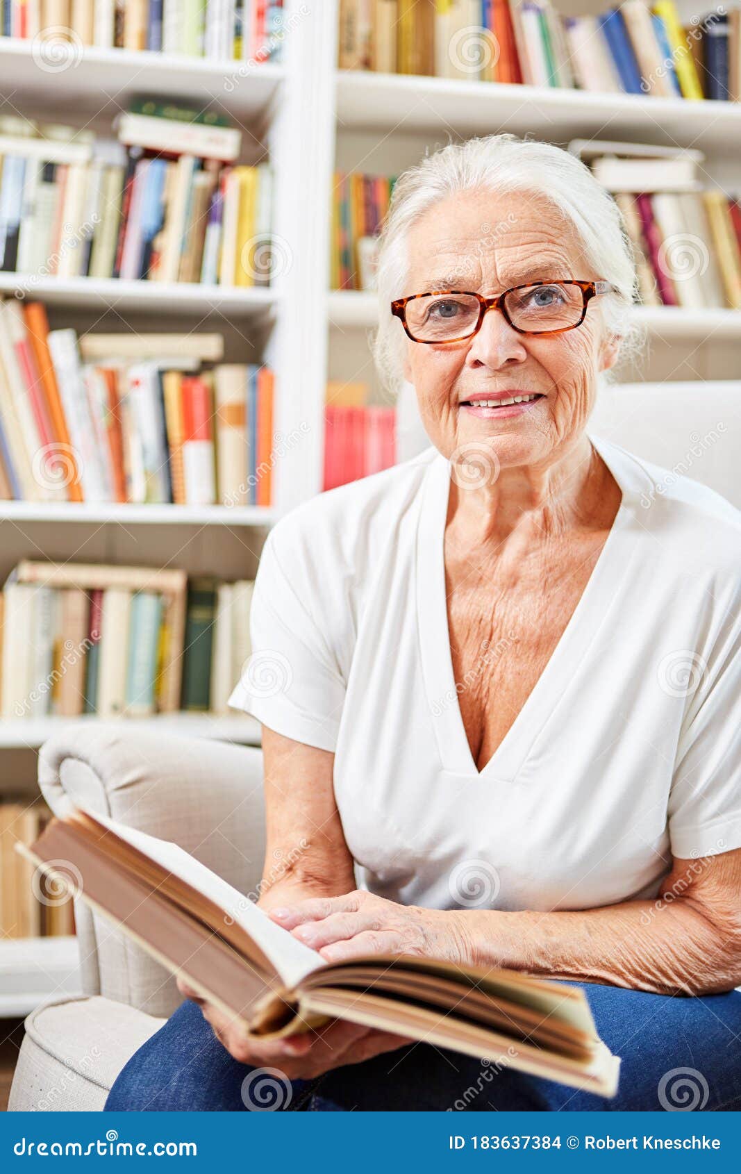 Senior Woman with a Book in the Library Stock Photo - Image of aging ...