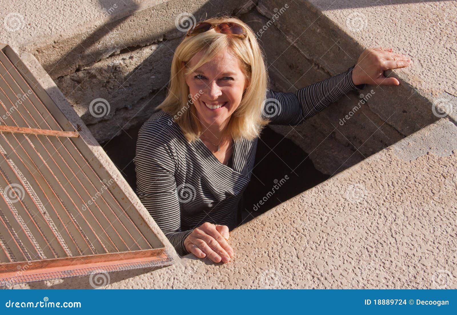 Senior Woman Climbing Out of a Hole. Stock Photo - Image of climb ...