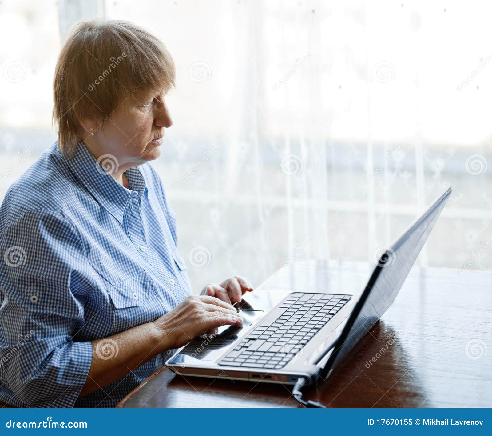 Senior woman with computer stock image. Image of cafe - 17670155