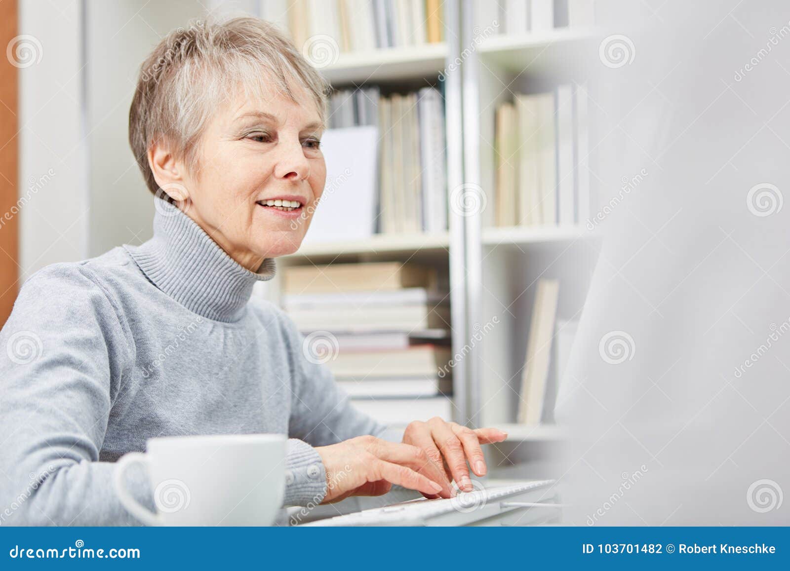 Senior woman with computer stock photo. Image of learn - 103701482