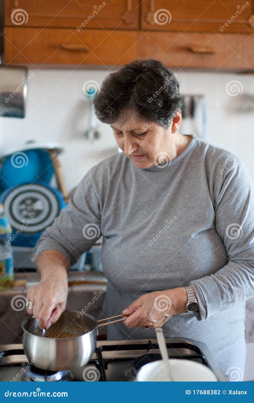 Senior woman cooking stock photo. Image of cooking, glass - 17688382