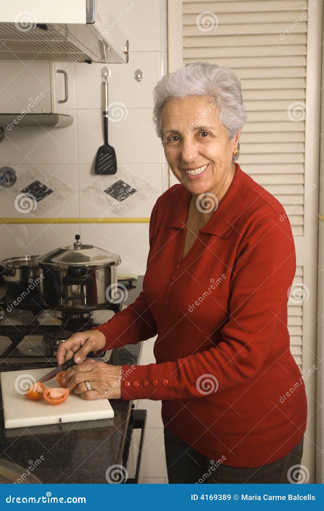 Senior woman cooking stock image. Image of activity, homemade - 4169389