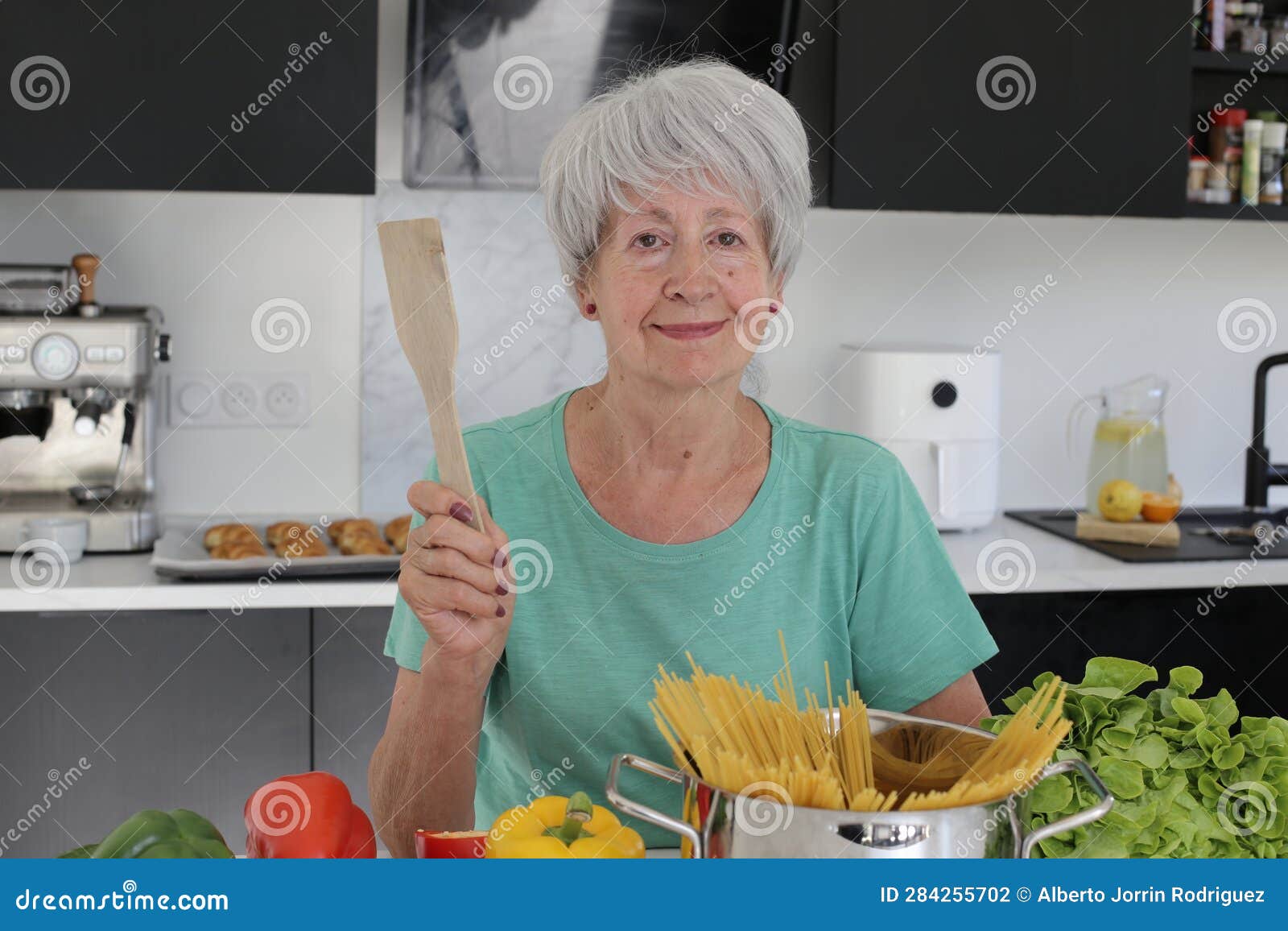 Senior Woman Cooking Some Spaghetti Stock Photo - Image of meal, food ...