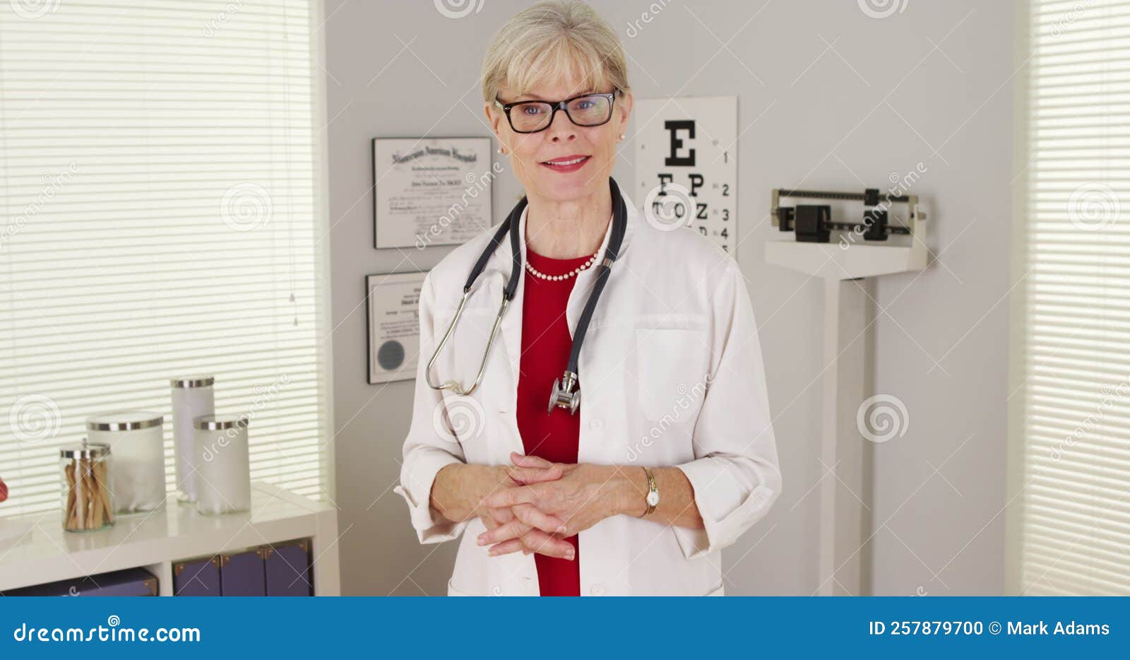 Senior Woman Doctor Standing Looking at Camera Stock Footage - Video of ...
