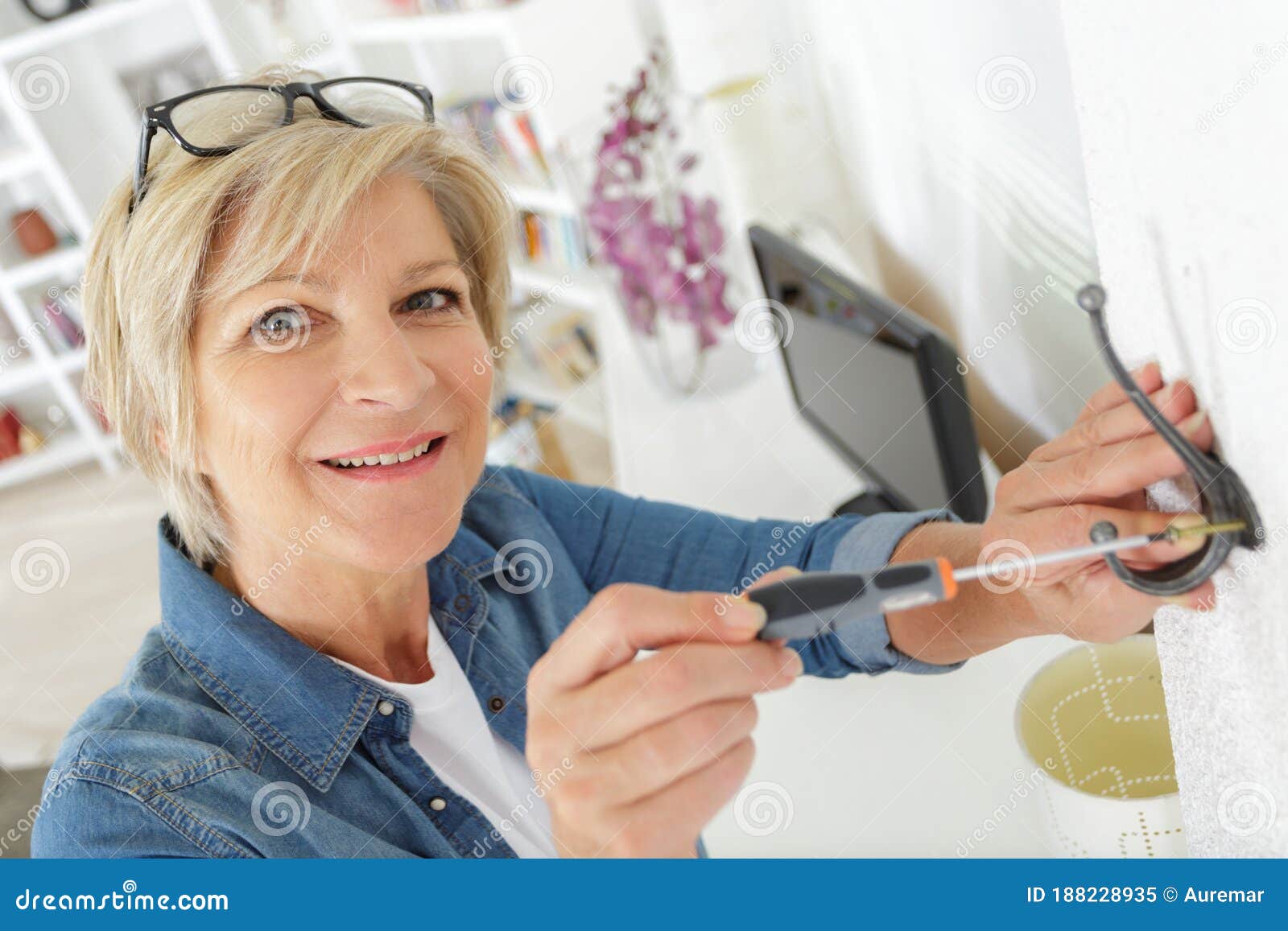 Senior woman doing diy stock image. Image of renovation - 188228935
