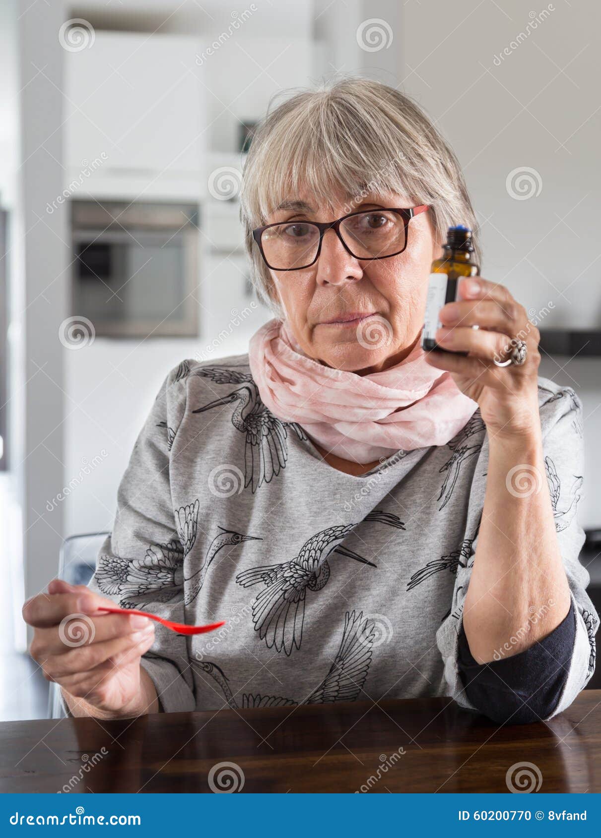 Senior Woman Drip Medication on Spoon Stock Photo - Image of drop ...