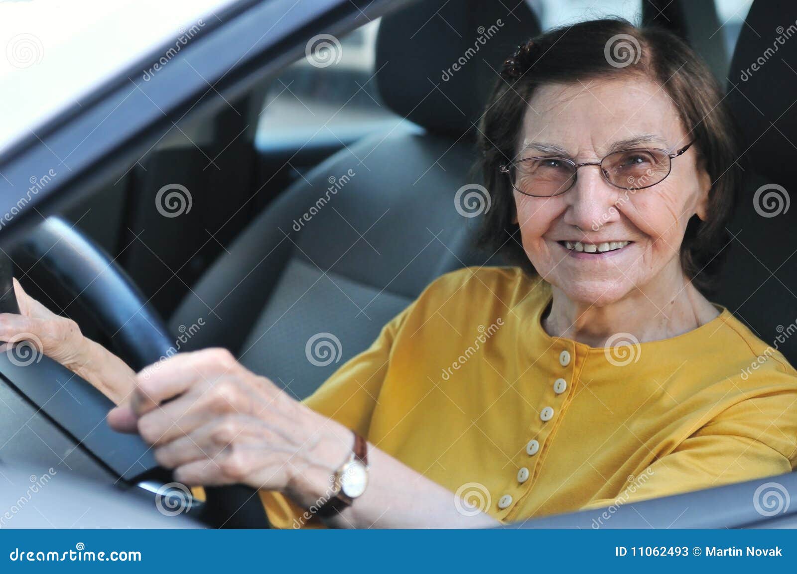 Senior woman driving car stock image. Image of lifestyle - 11062493