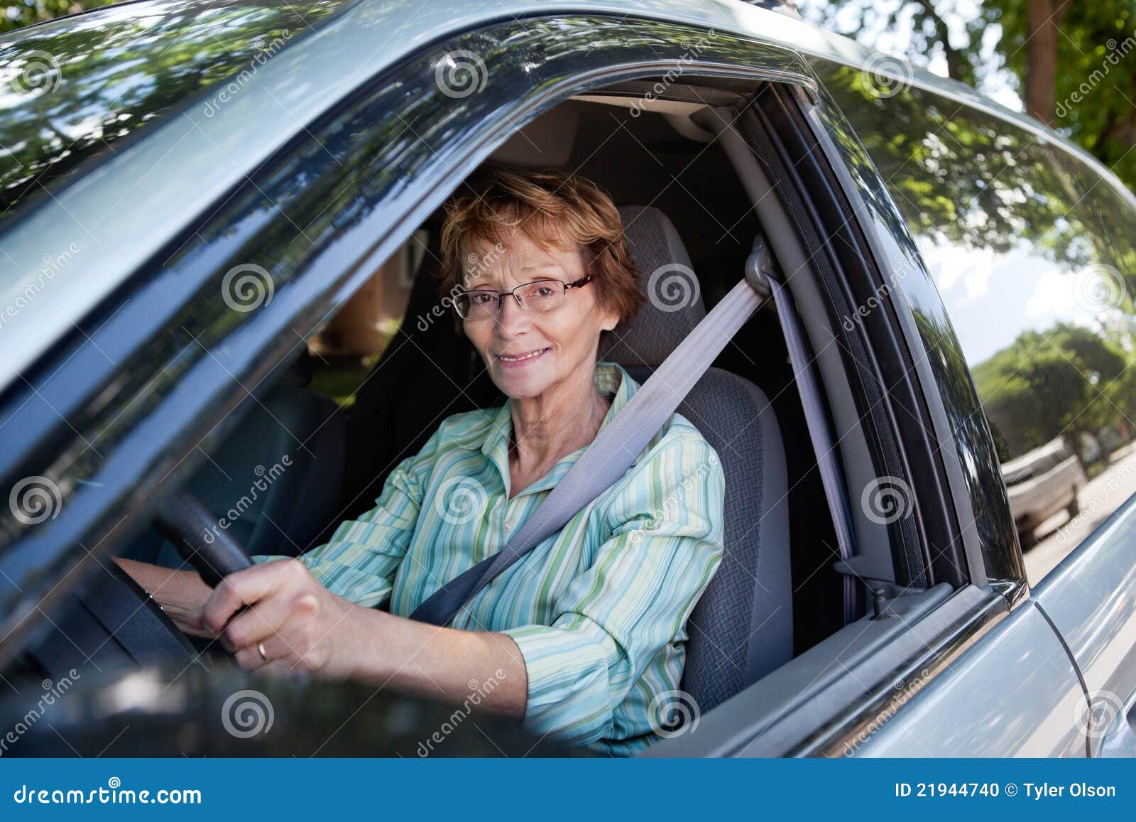 Senior woman driving car stock photo. Image of elderly - 21944740