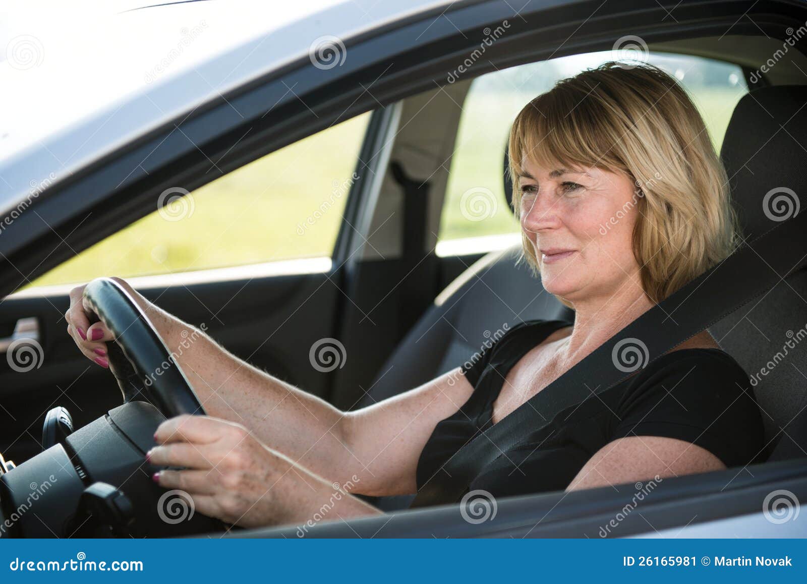 Senior woman driving car stock image. Image of detail - 26165981