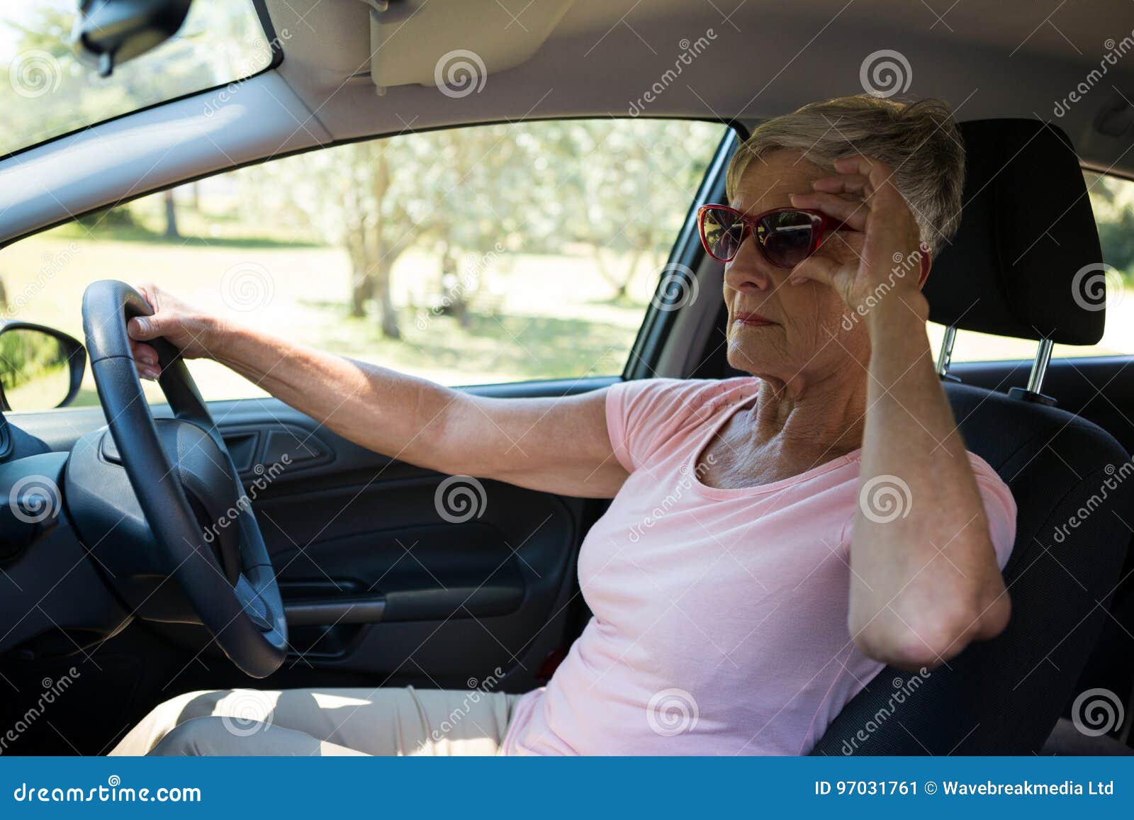 Senior woman driving a car stock image. Image of caucasian - 97031761
