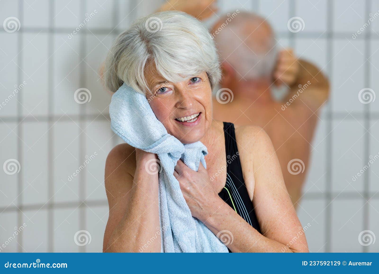 Senior Woman Drying Herself after Swimming Pool Stock Image - Image of ...