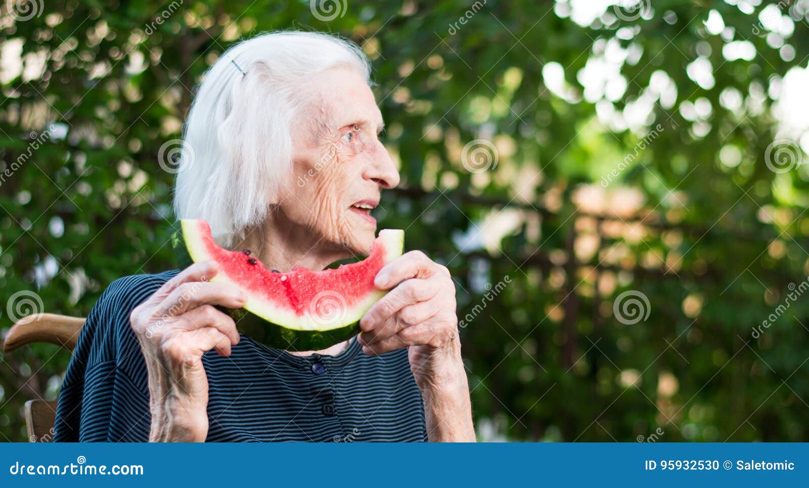 Senior Woman Eating Watermelon Outdoors Stock Photo - Image of people ...