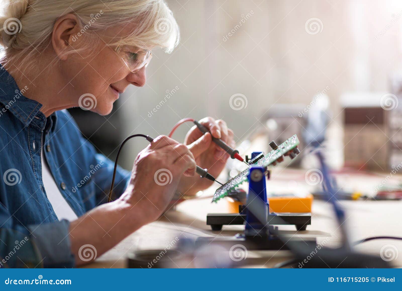 Senior Woman in Electronics Workshop Stock Image - Image of garage ...