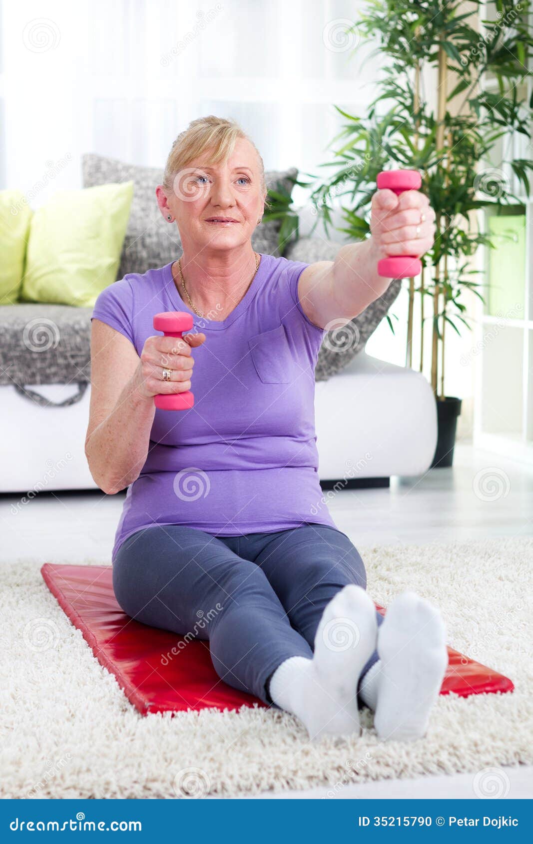 Senior Woman Exercise with Weights at Home Stock Photo - Image of ...