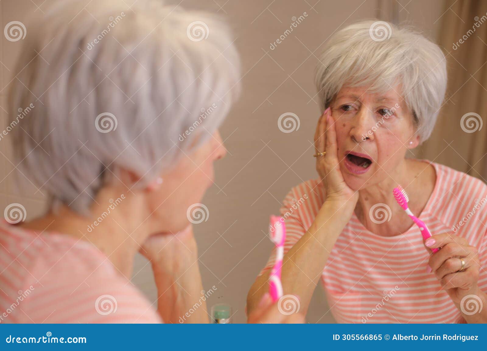 Senior Woman Experimenting Pain while Brushing Her Teeth Stock Image ...