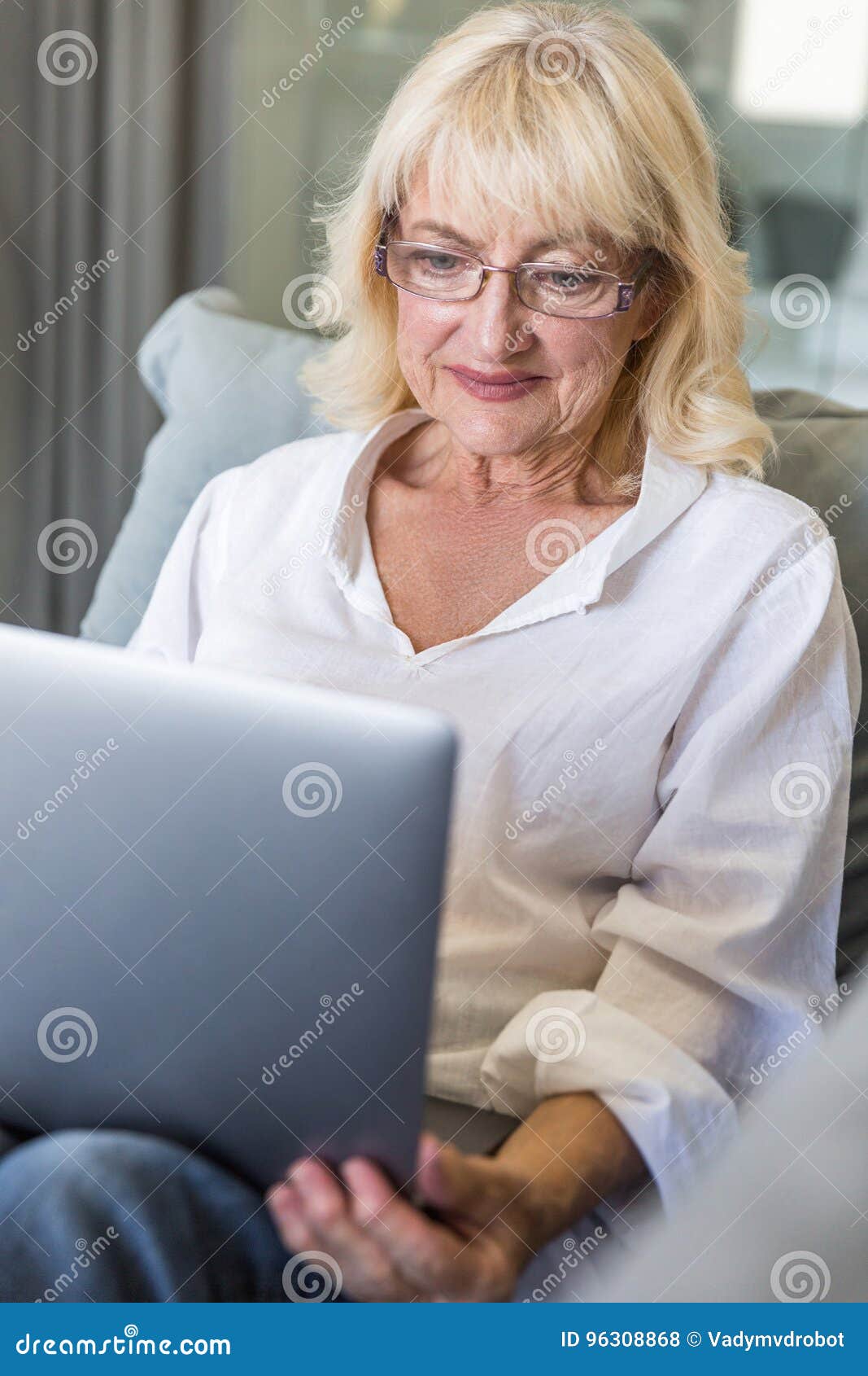Senior Woman in Eyeglasses Using Laptop Computer Stock Photo - Image of ...