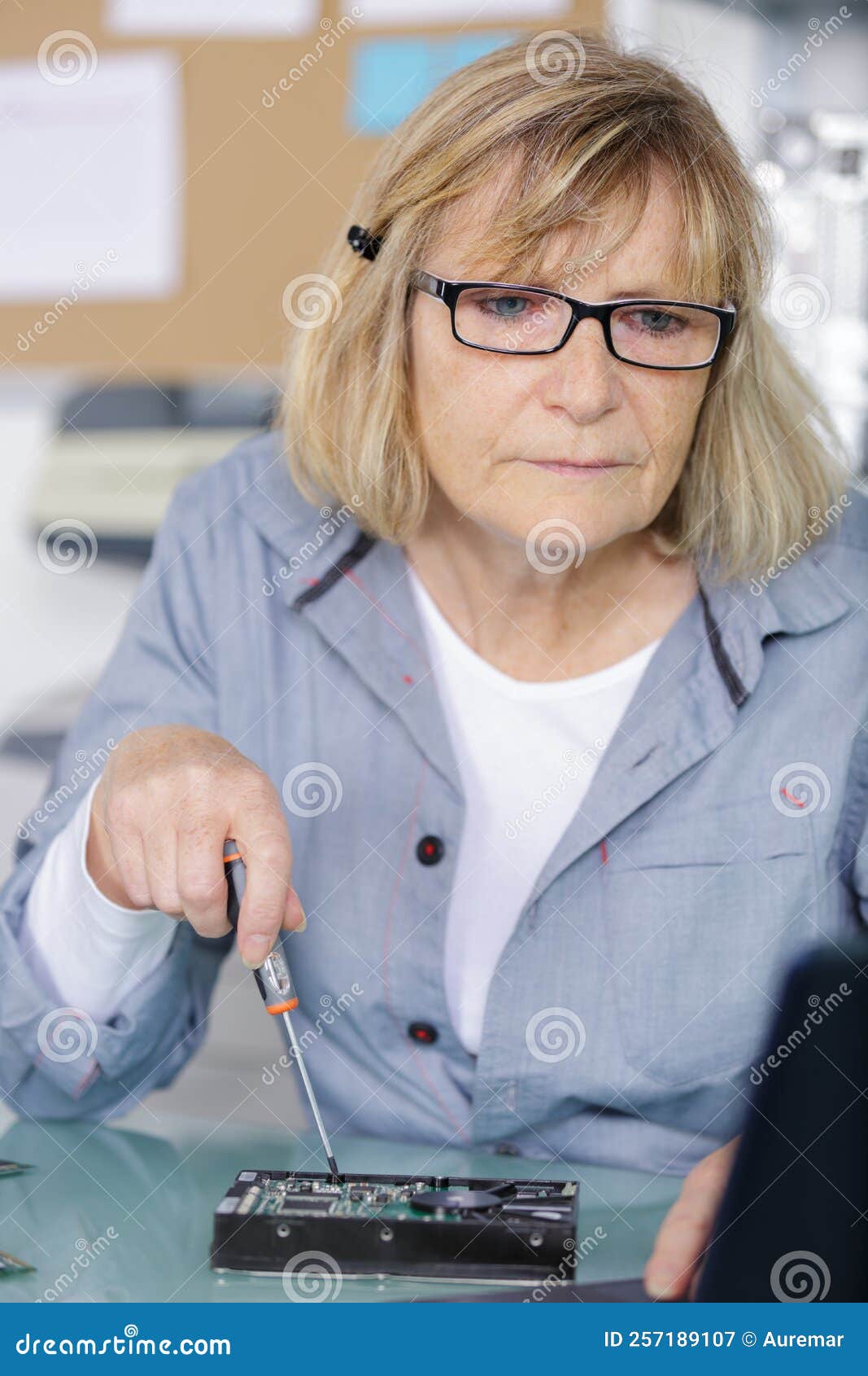 Senior Woman Fixing Computer Hd Stock Image - Image of board, drill ...