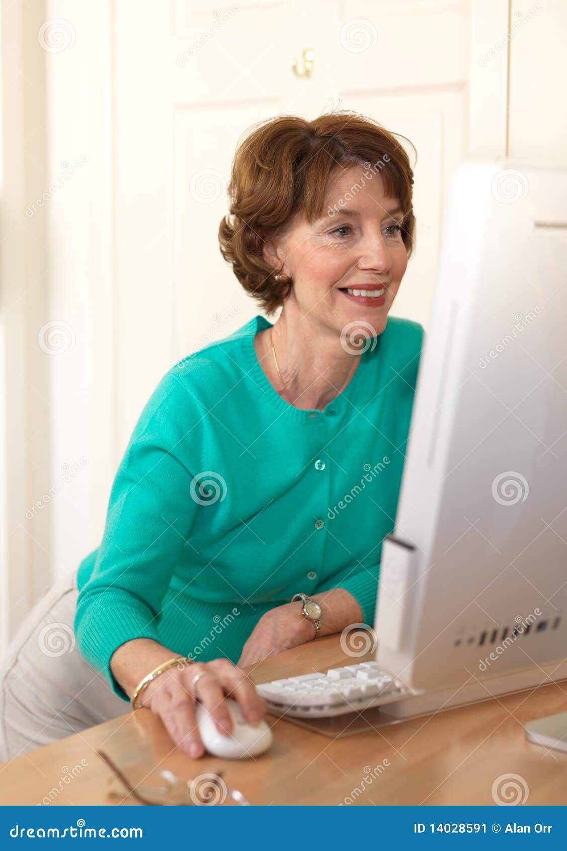 Senior Woman Happily Using Computer Stock Image - Image of senior ...