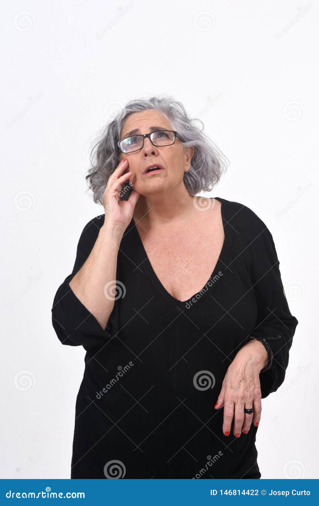 Senior Woman Having a Doubt or Question on White Background Stock Photo ...