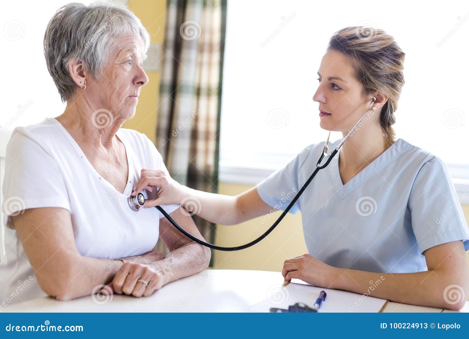 Senior Woman With Her Caregiver At Home Stock Image Image Of Indoors