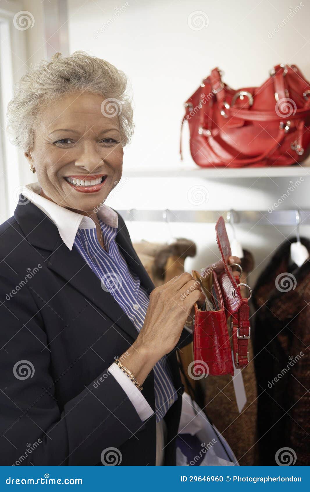Senior Woman Holding Purse at Store Stock Photo - Image of customer ...