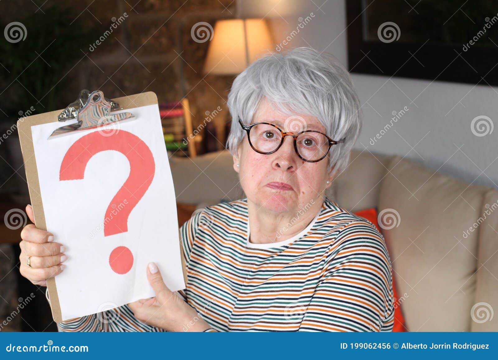 Senior Woman Holding Question Mark Stock Photo - Image of mistake ...