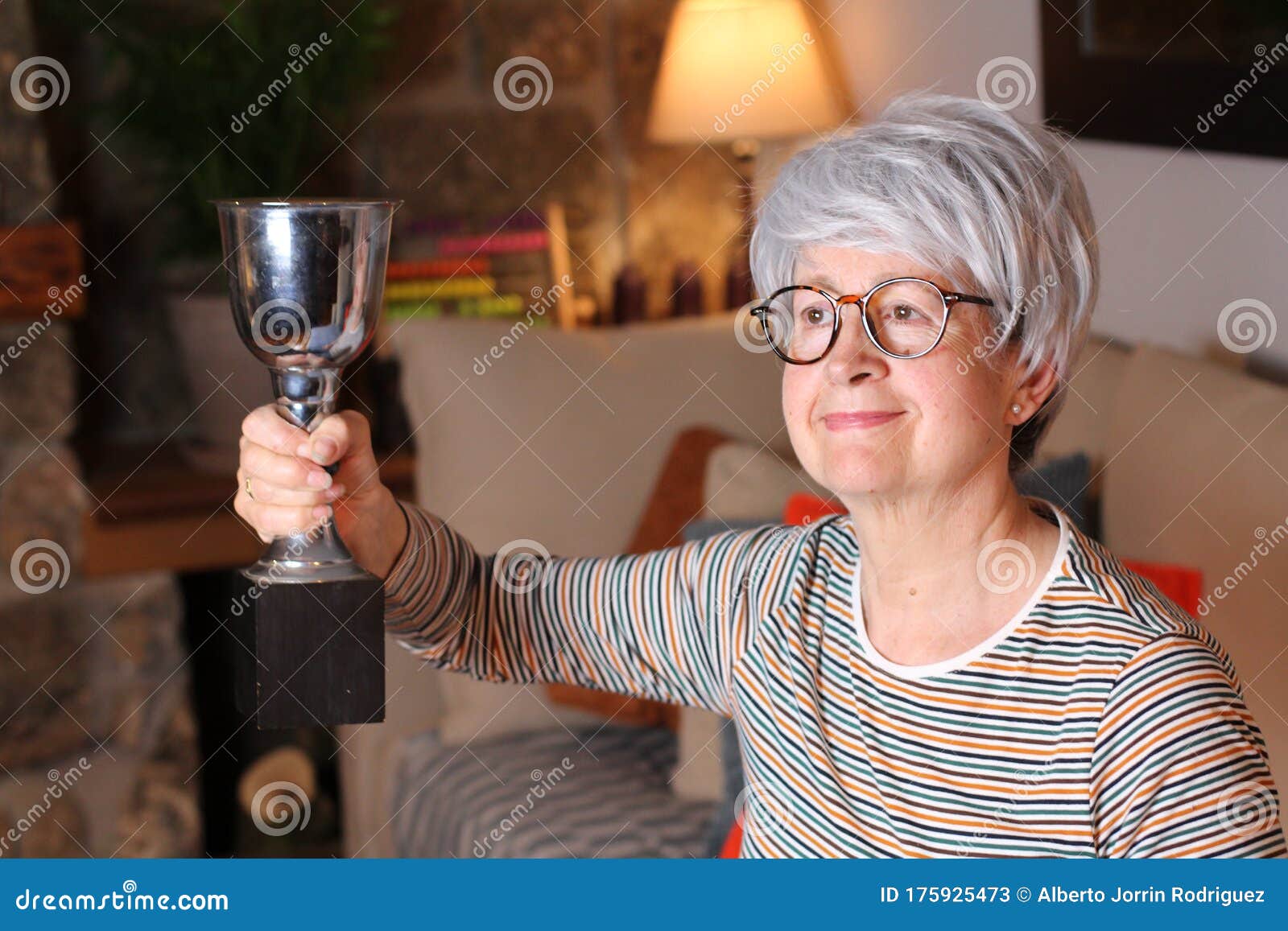 Senior Woman Holding a Trophy Stock Image - Image of activity ... Senior Woman Holding a Trophy Stock Image - Image of activity ...