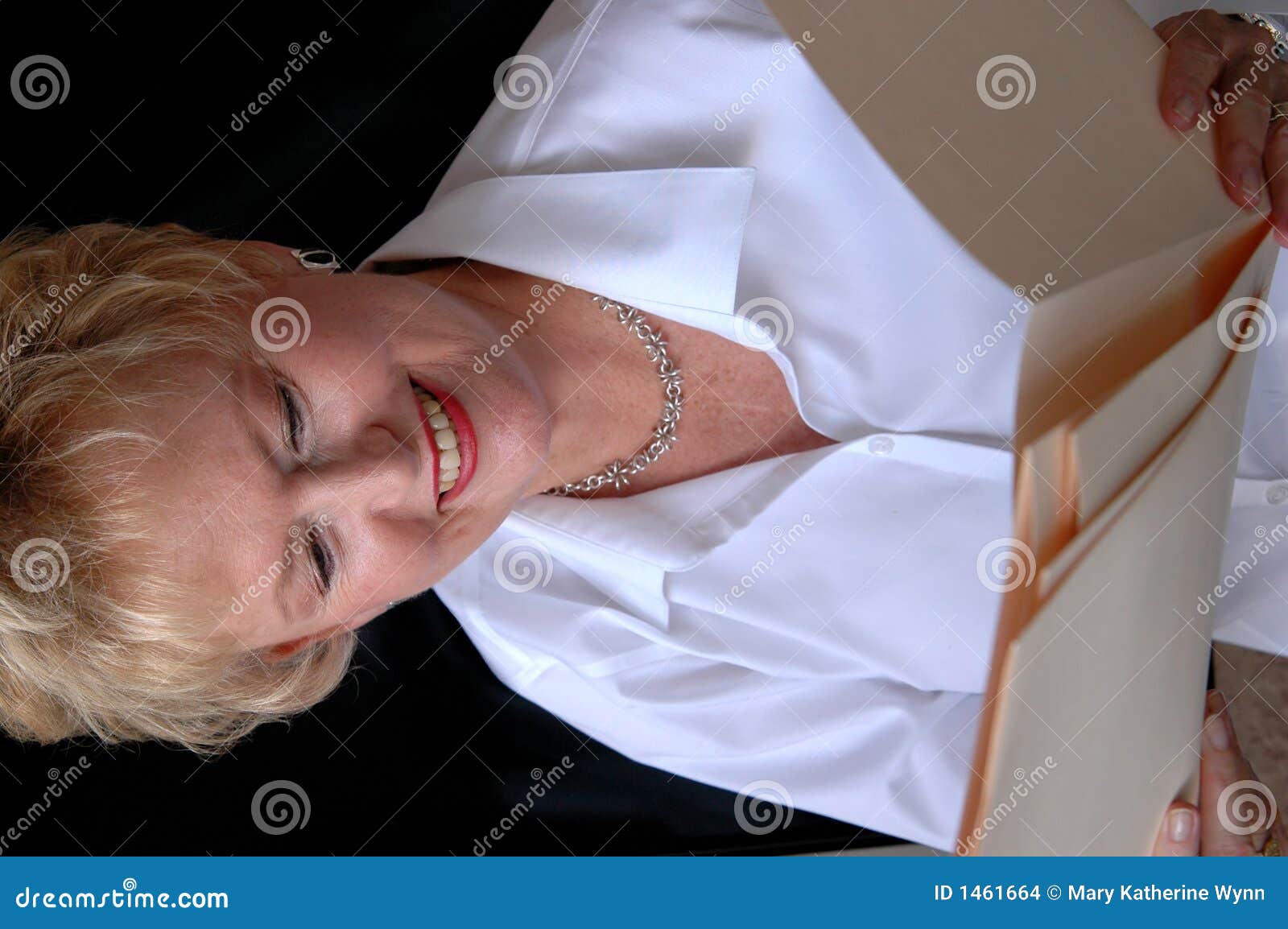 Senior Woman Looking at Files Stock Photo - Image of inquisitive ...