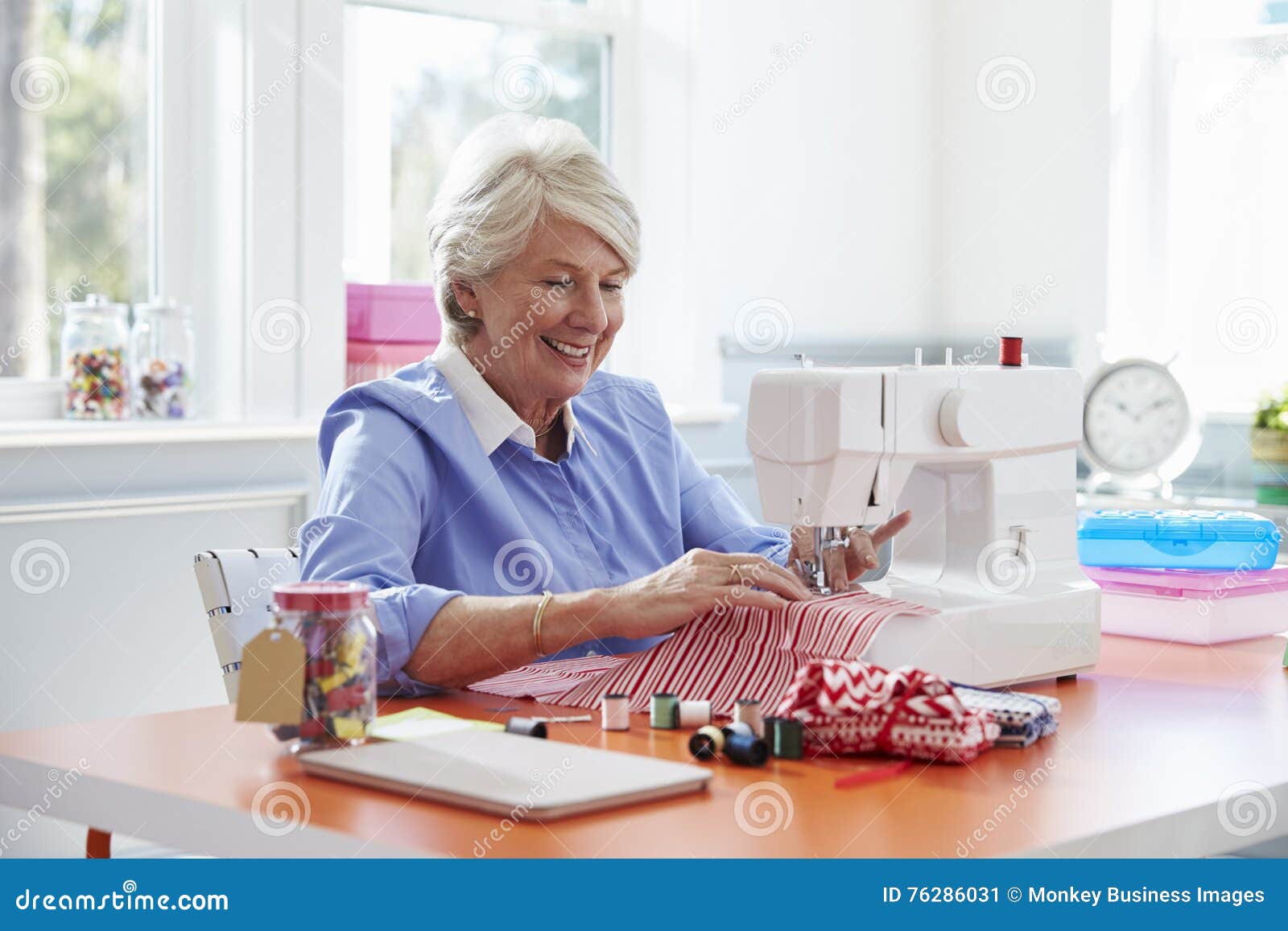 Senior Woman Making Clothes Using Sewing Machine at Home Stock Image ...