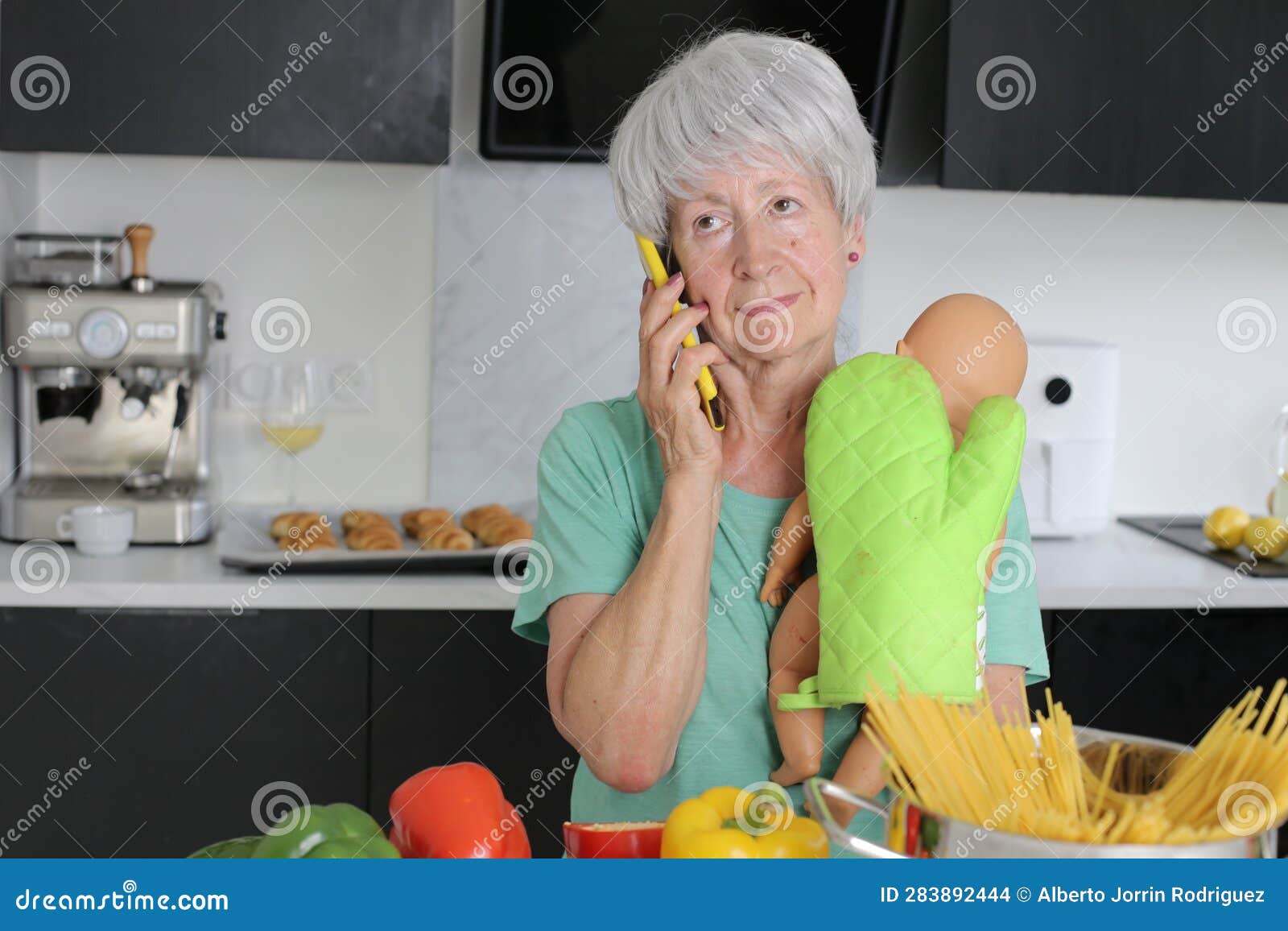 Senior Woman Multitasking in the Kitchen Stock Photo - Image of care ...