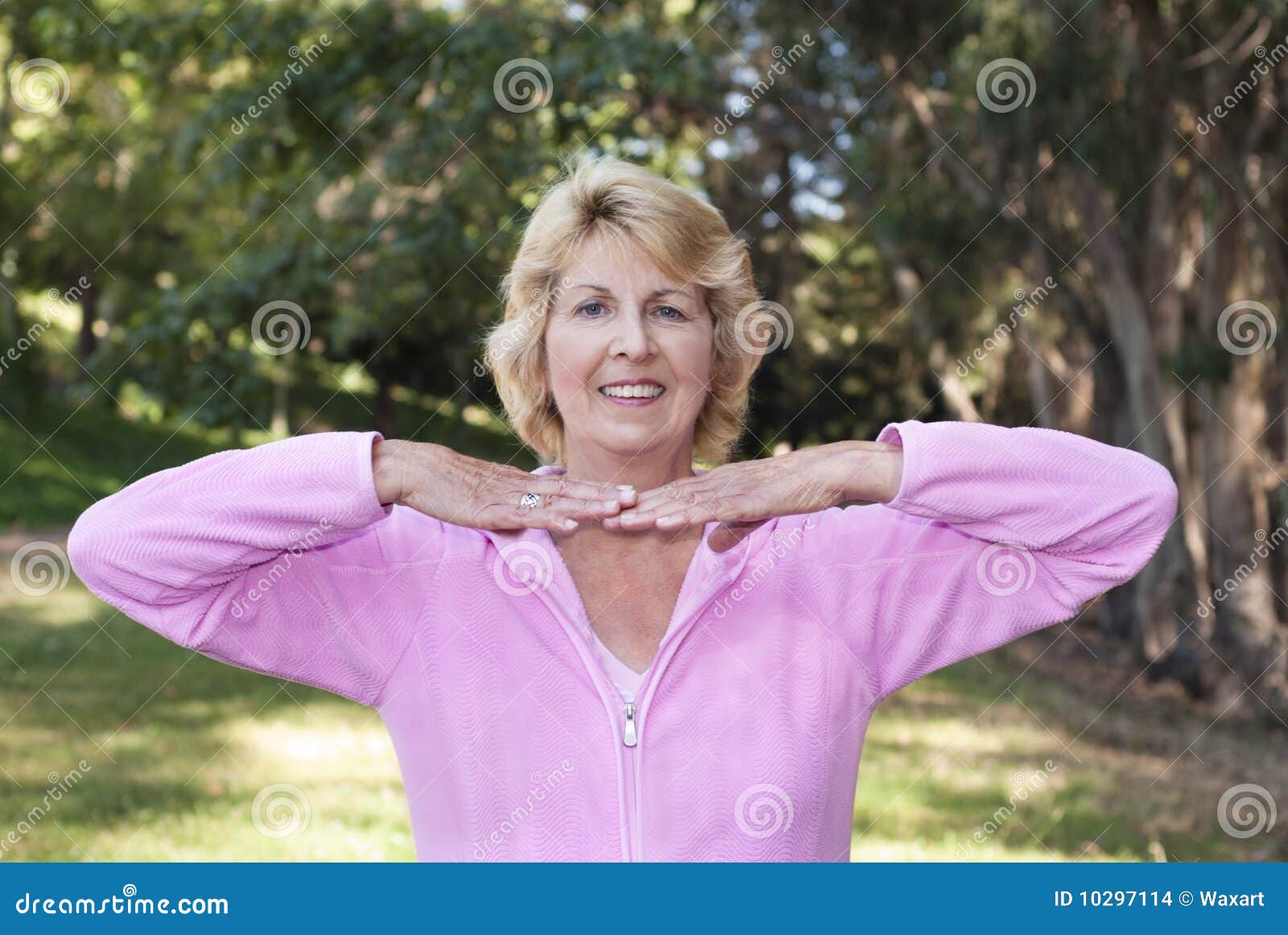 Senior Woman Practicing Posture in Park Stock Photo - Image of seniors ...