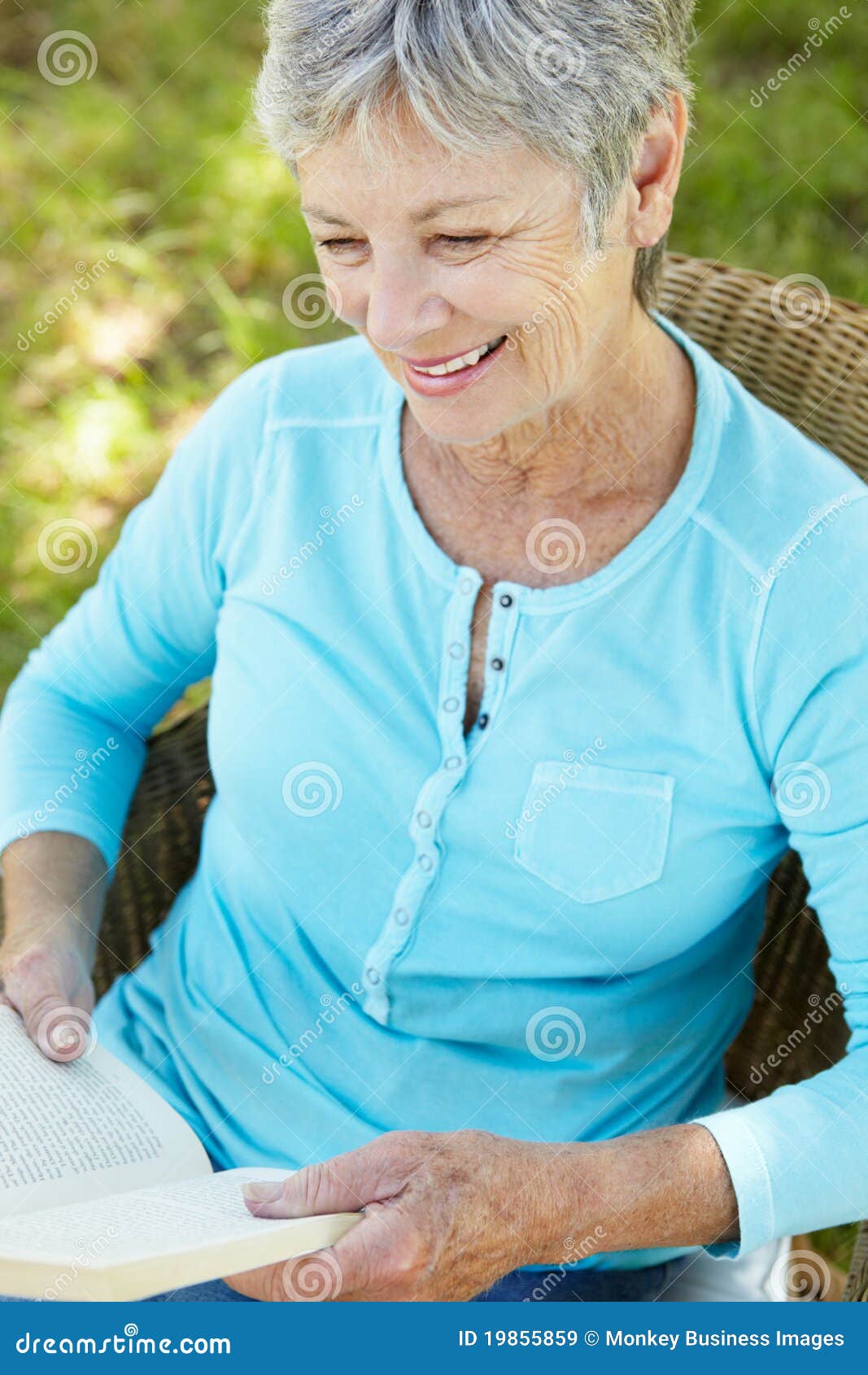Senior Woman Reading a Book Stock Image - Image of sitting, looking ...