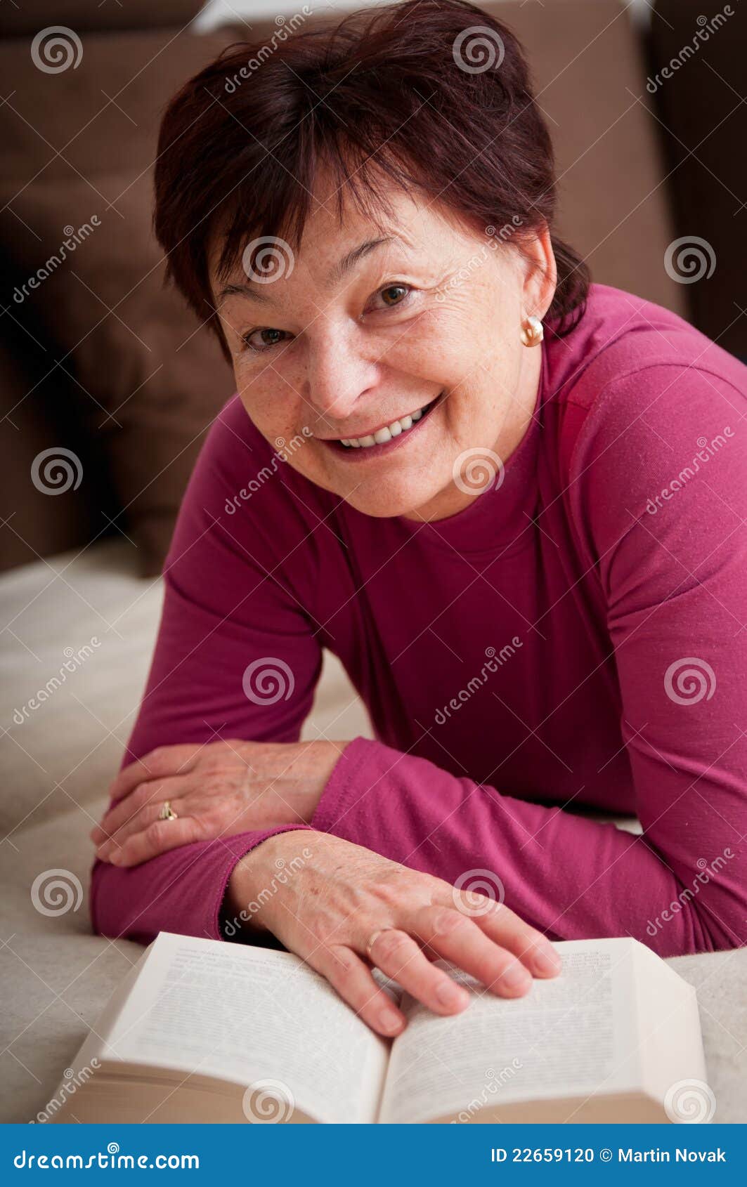 Senior woman reading book stock photo. Image of female - 22659120