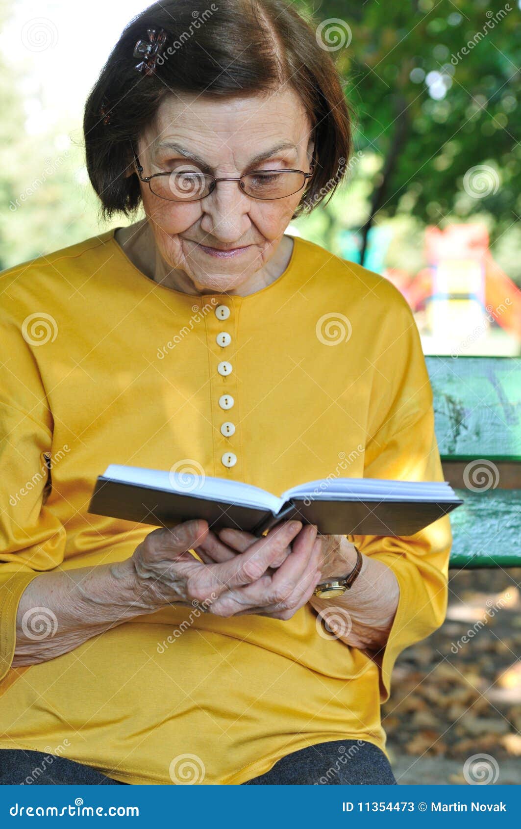 Senior Woman Reading Book Autdoors Stock Image - Image of person ...