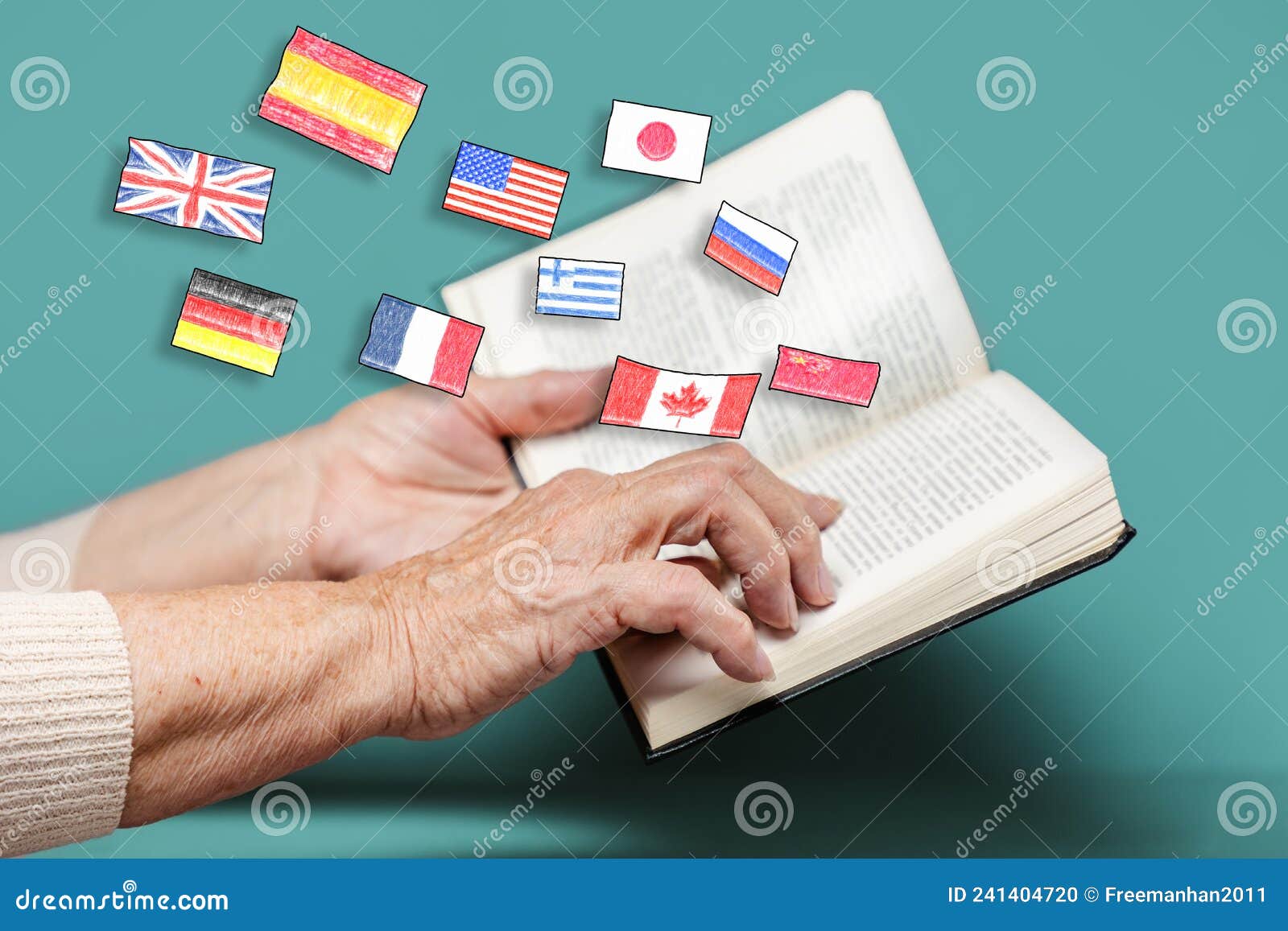 A Senior Woman Reading a Book with Flags of Different Countries. Close ...