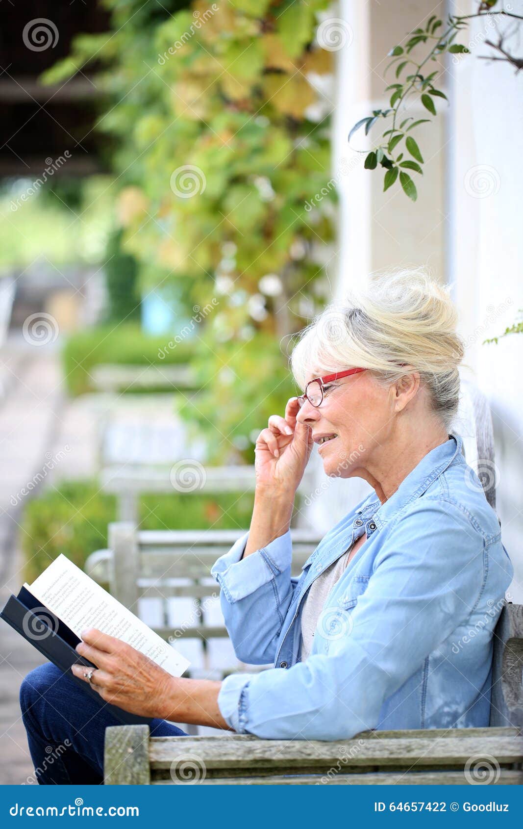 Senior Woman Reading Book in the Garden Stock Photo - Image of alone ...