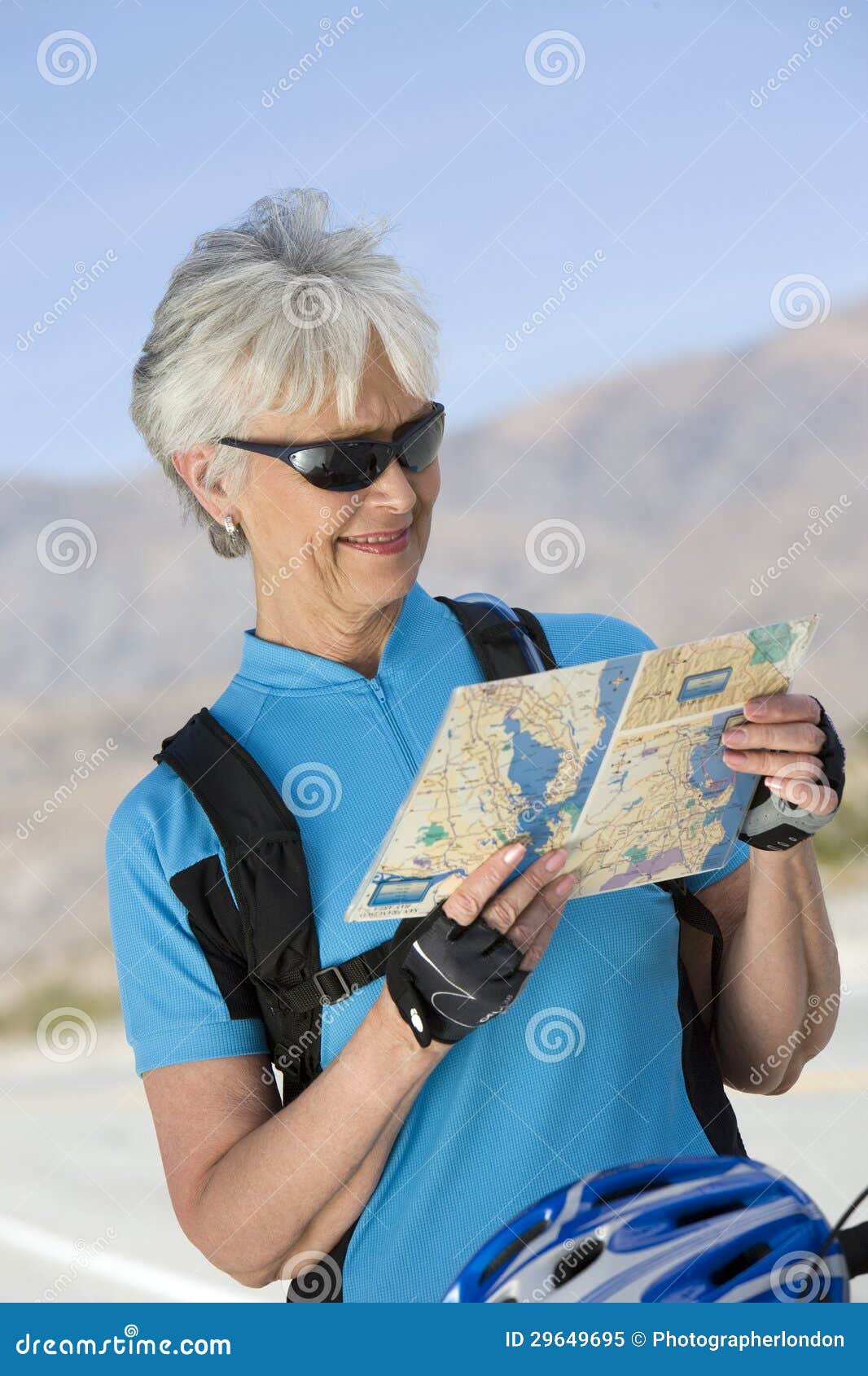 Senior Woman Reading Map stock image. Image of person - 29649695