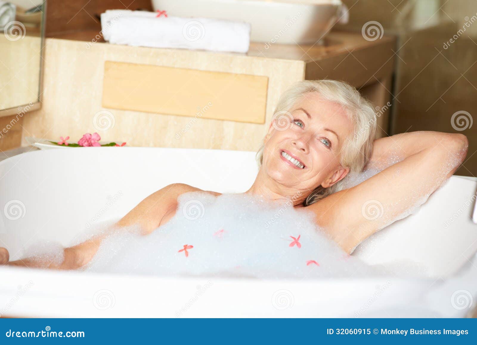 Senior Woman Relaxing in Bath Drinking Champagne Stock Image - Image of ...