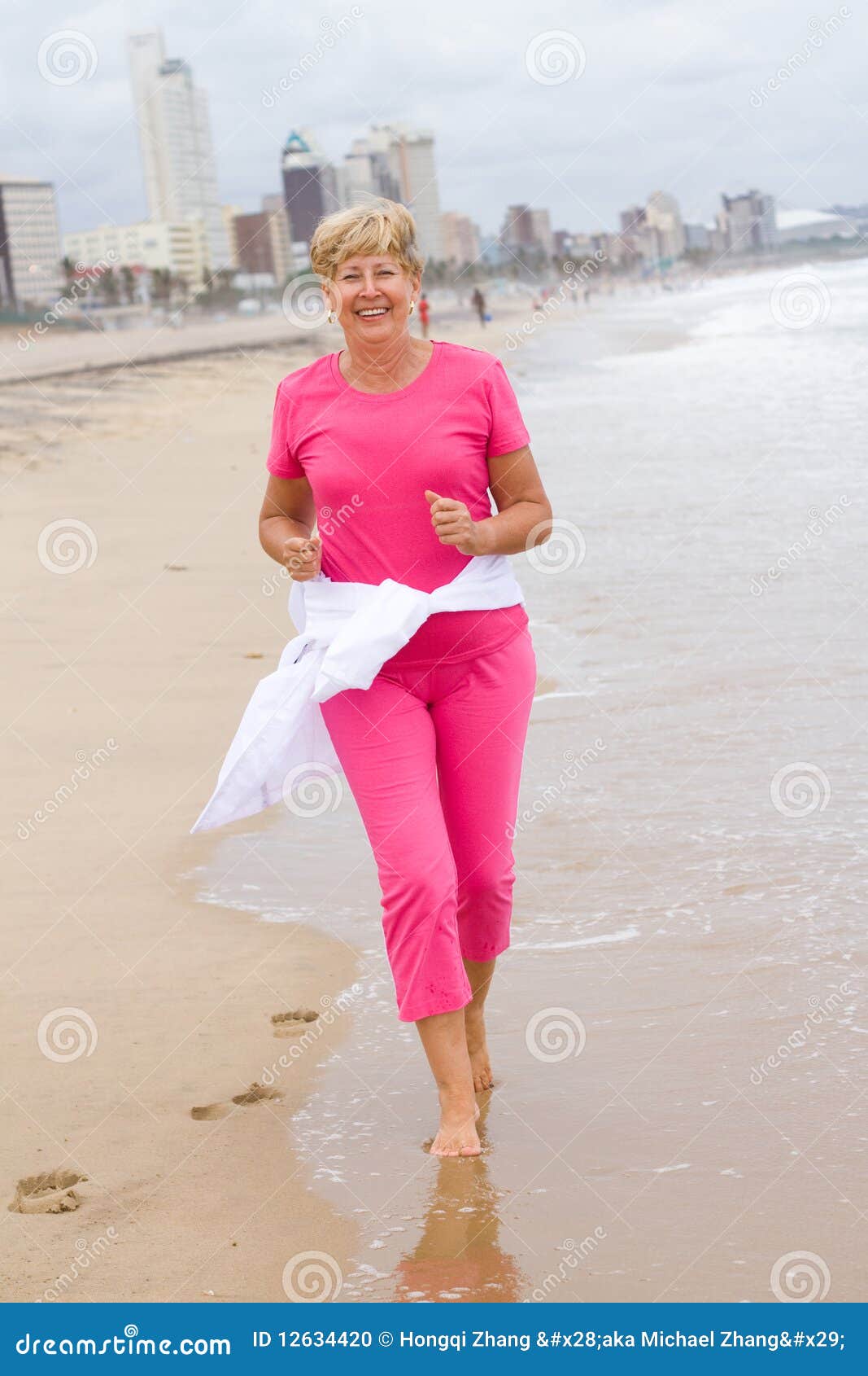 Senior woman running stock photo. Image of aged, holiday - 12634420