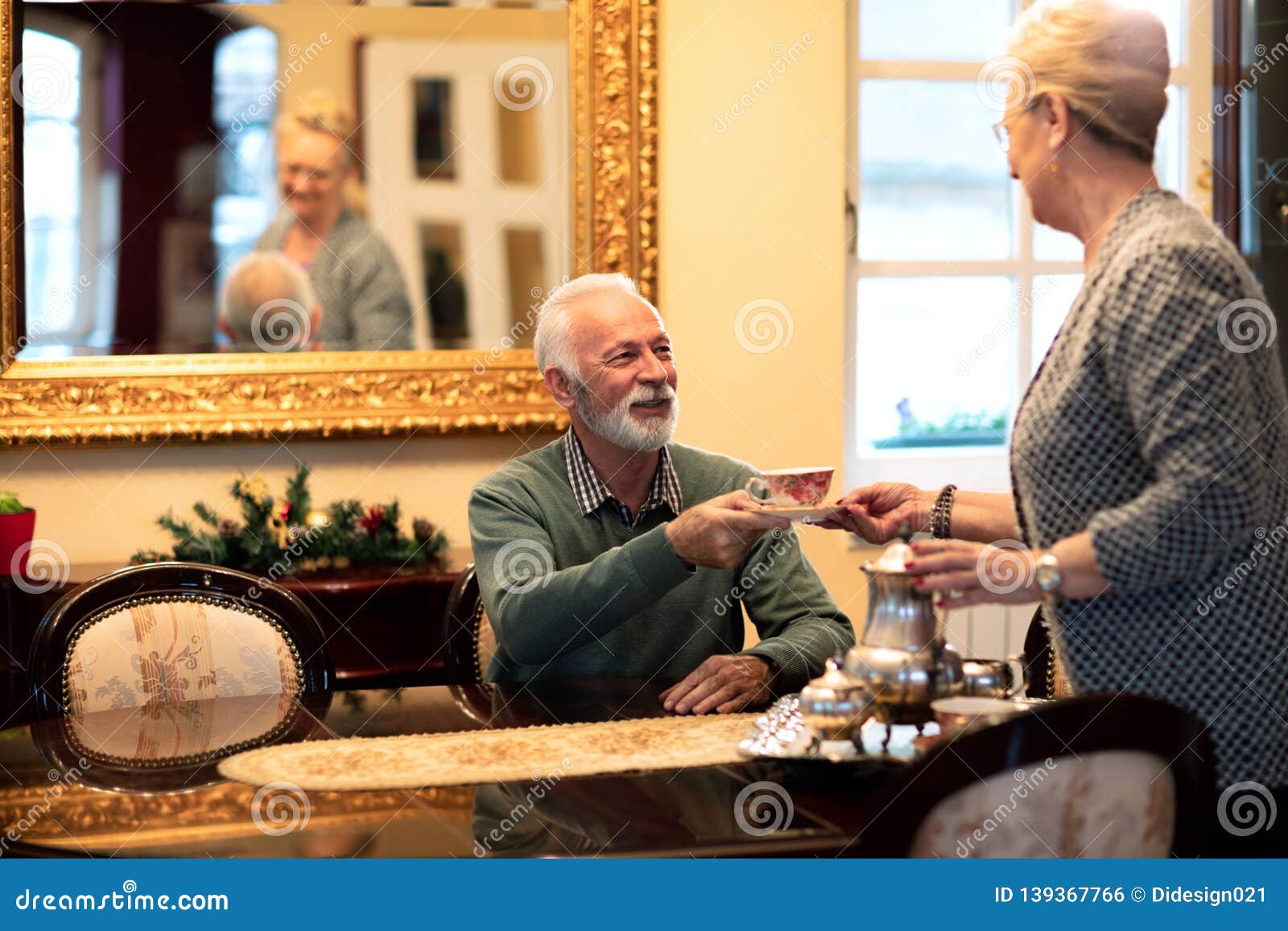 Senior Woman Serving Tea To Her Husband Stock Photo - Image of doctor ...