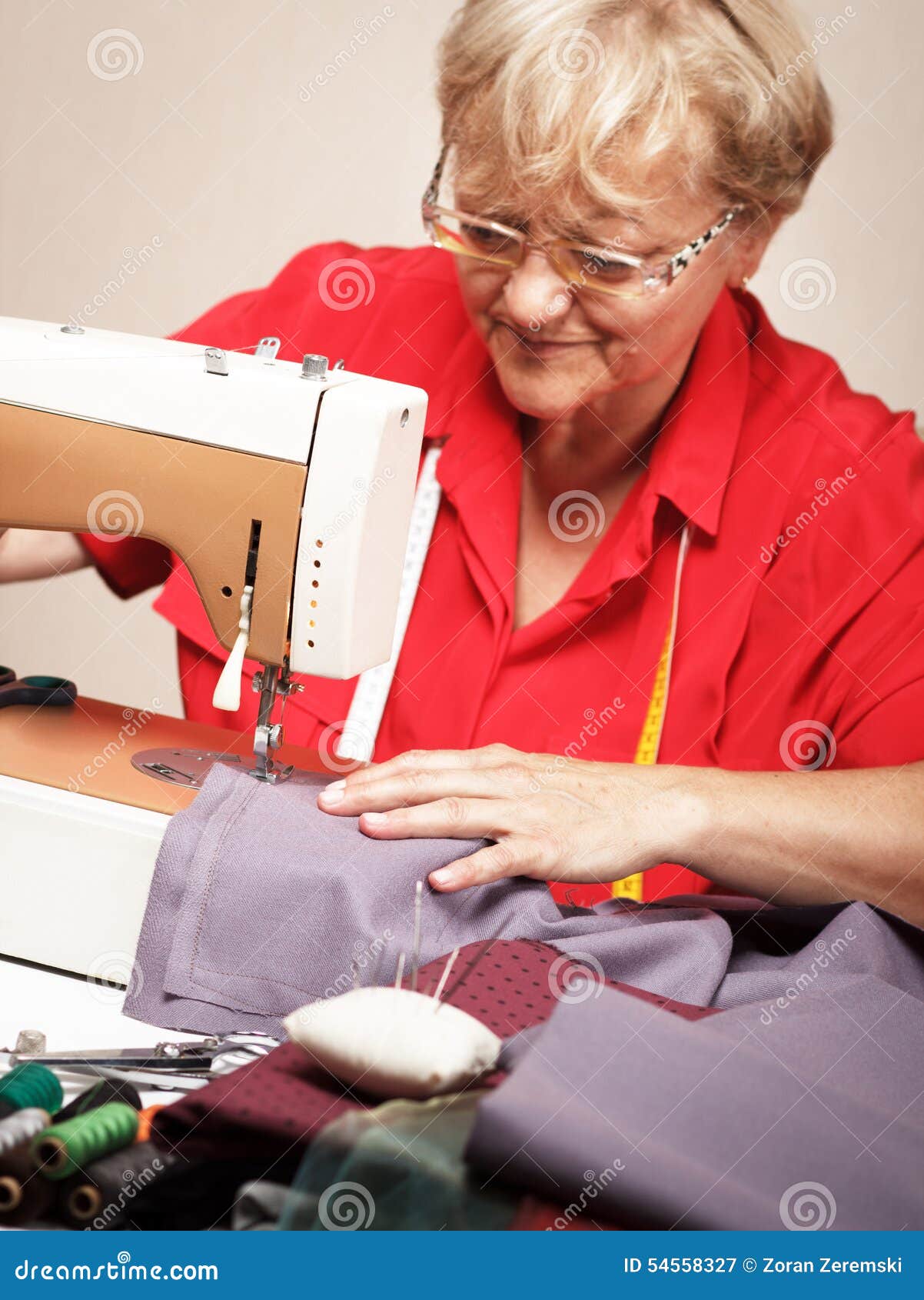 A senior woman sewing stock image. Image of creativity - 54558327