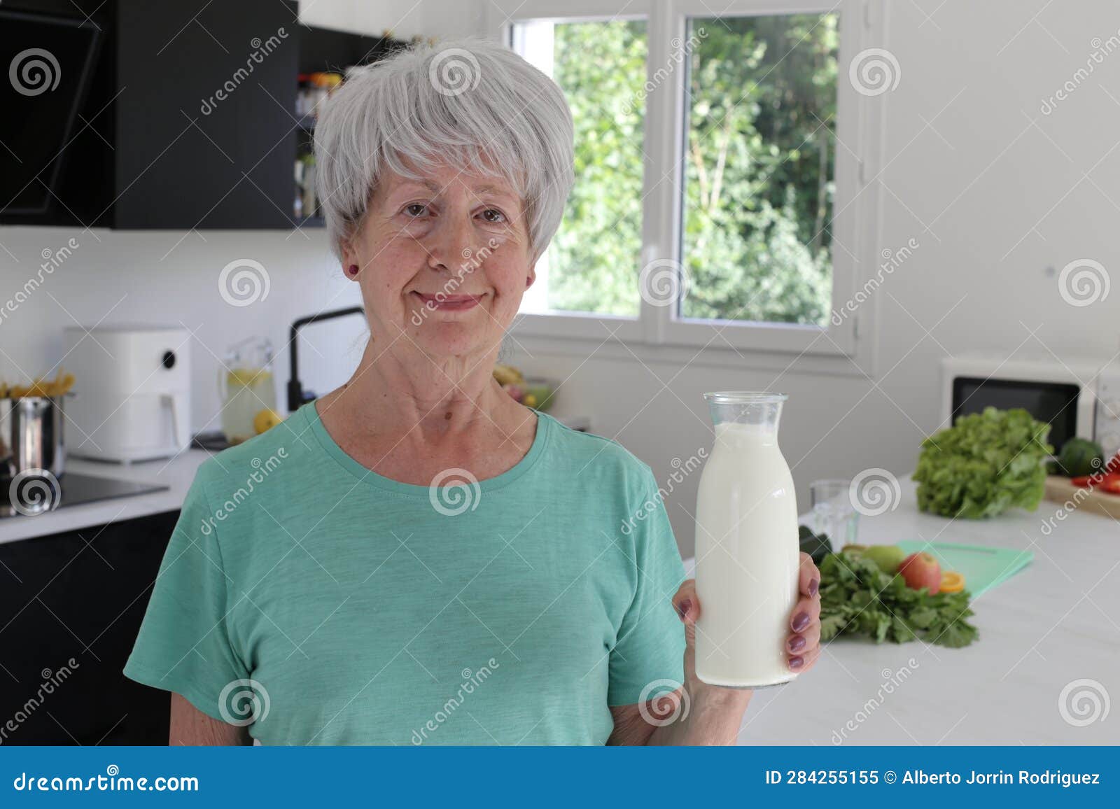 Senior Woman Showing Fresh Milk Stock Image - Image of dairy ...