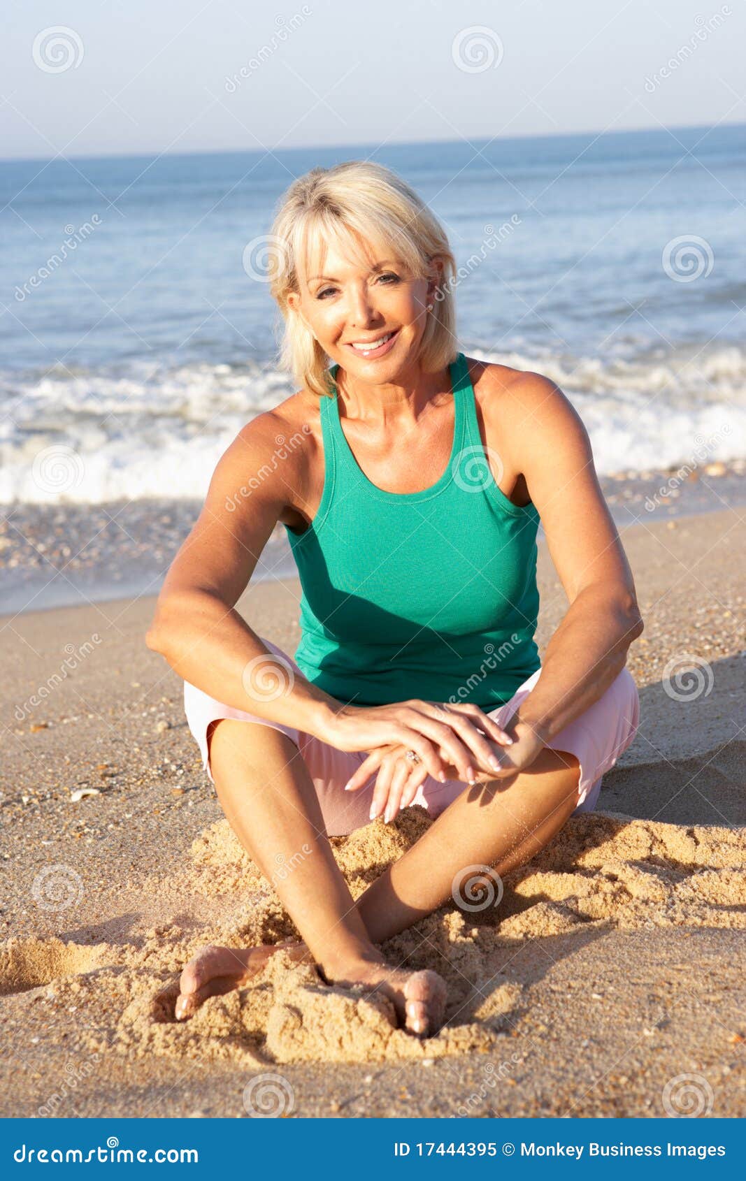 Senior Woman Sitting on Beach Relaxing Stock Image - Image of seniors ...