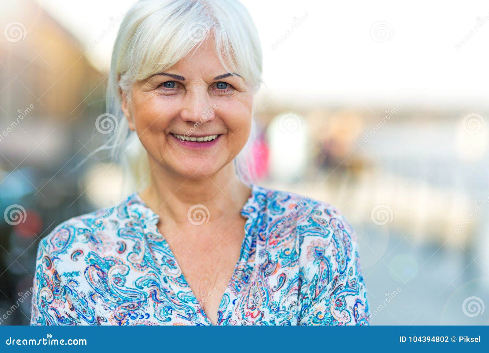 Senior Woman Standing Outdoors Stock Photo - Image of smiling, carefree ...