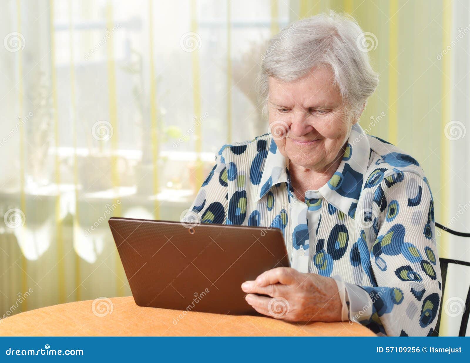 Senior woman with tablet. stock photo. Image of messages - 57109256