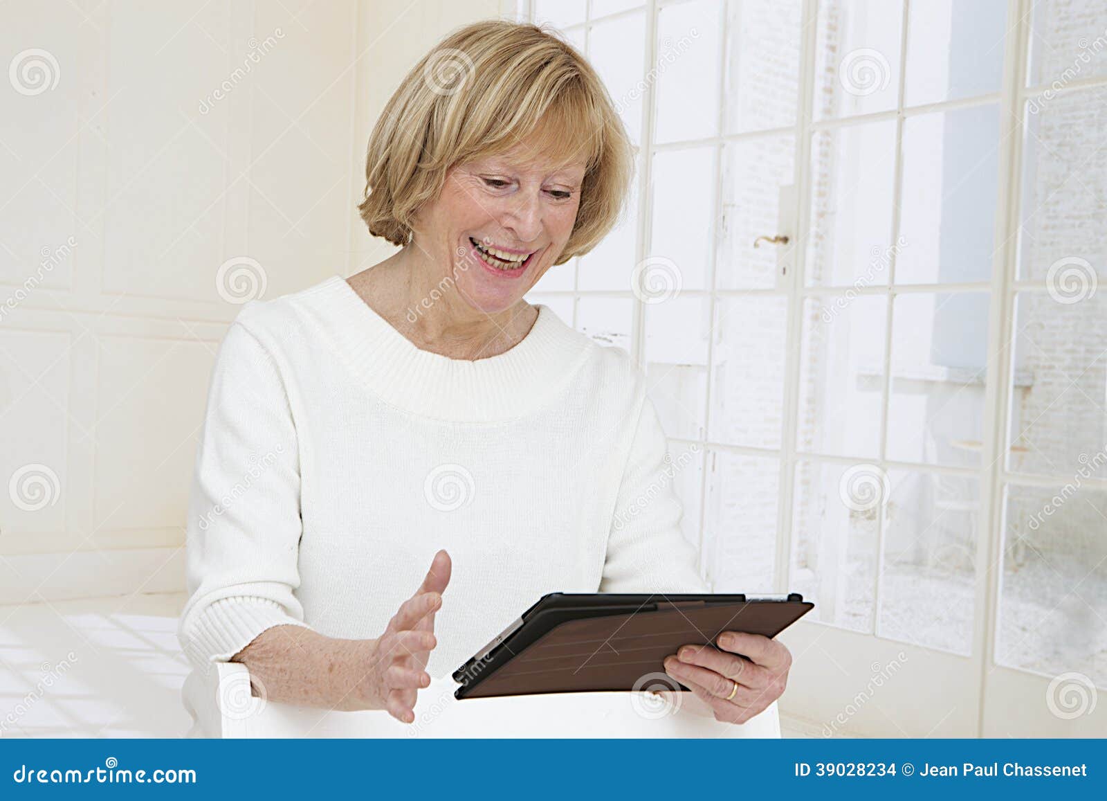 Senior Woman with Tablet Pc Stock Photo - Image of android, sitting ...