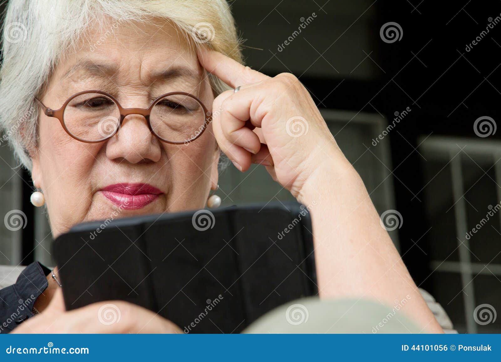 Senior woman with tablet stock photo. Image of adult - 44101056