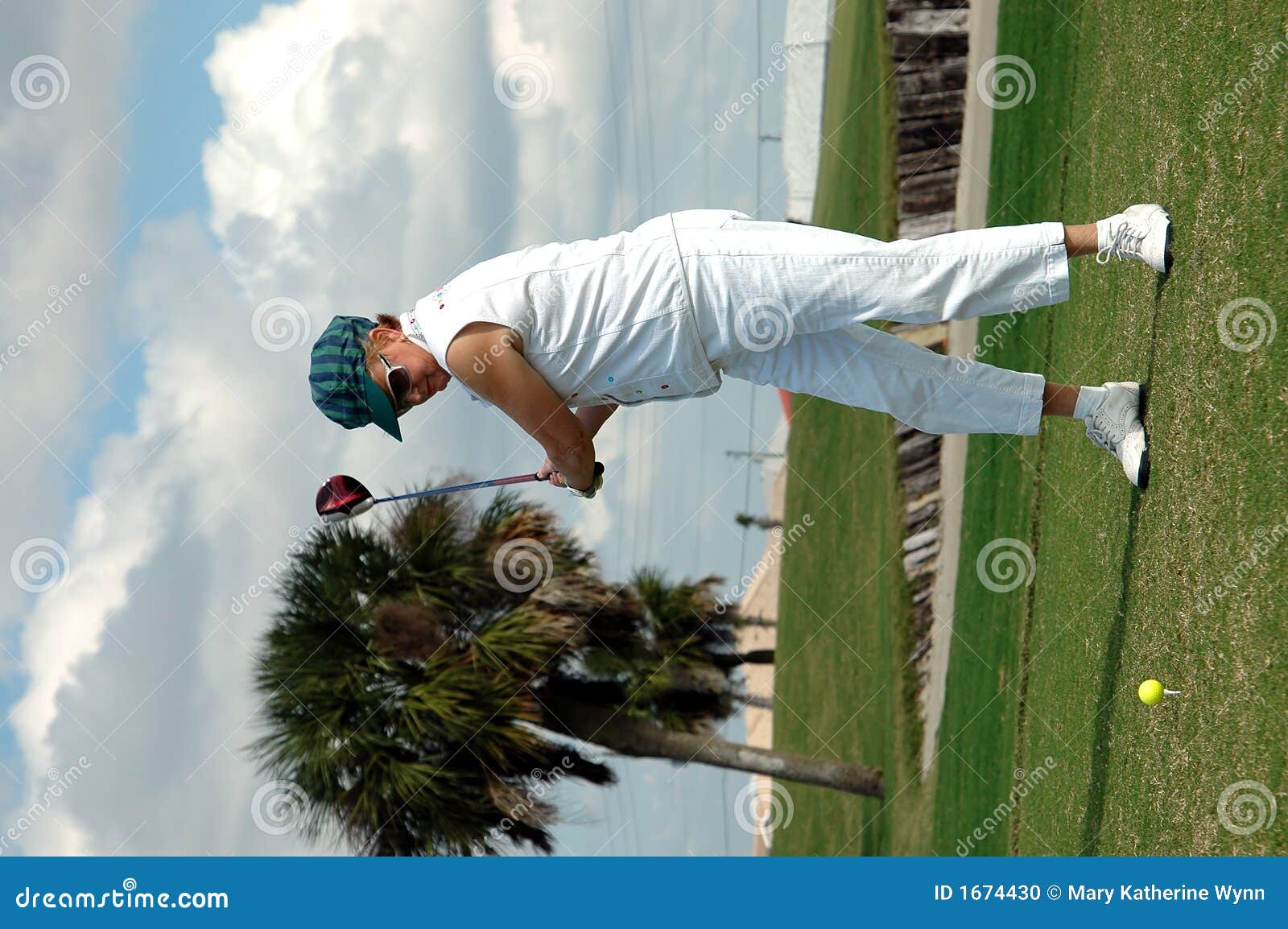 Senior woman tee off stock photo. Image of people, happiness - 1674430
